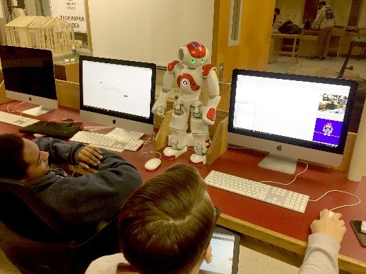 Feature a Teacher: NAO as a Programming Tool for Robotics Course